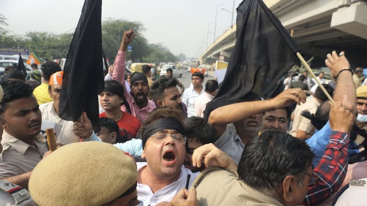 Delhi BJP workers stage protest against CM Arvind Kejriwal ahead of his ...