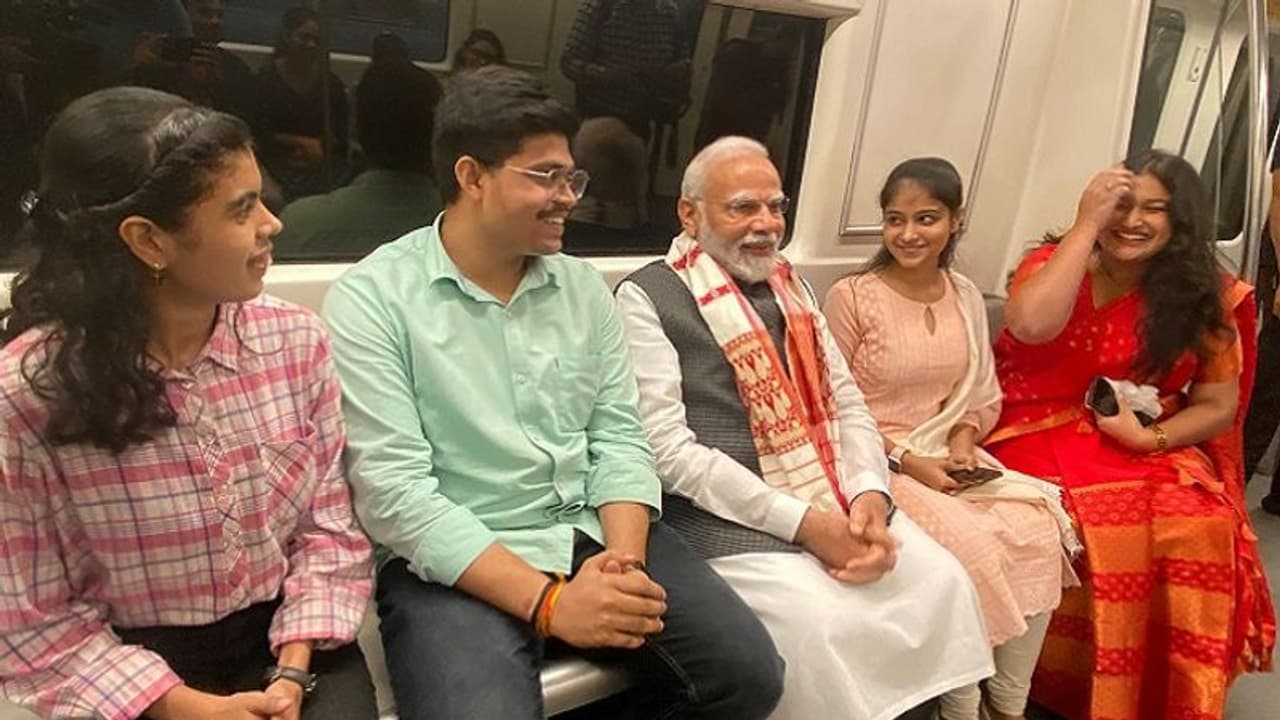 PM Modi takes metro train to attend centenary function in Delhi ...
