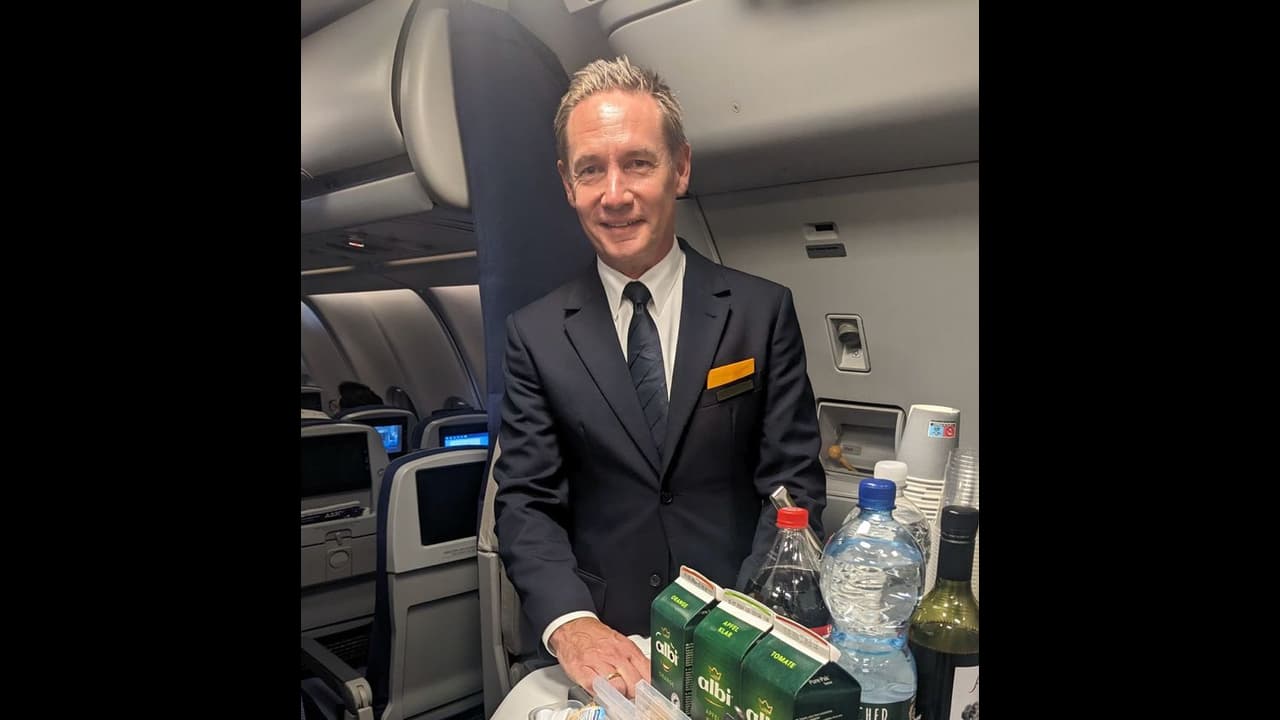 lufthansa airlines ceo jens ritter works as an additional crew member ...