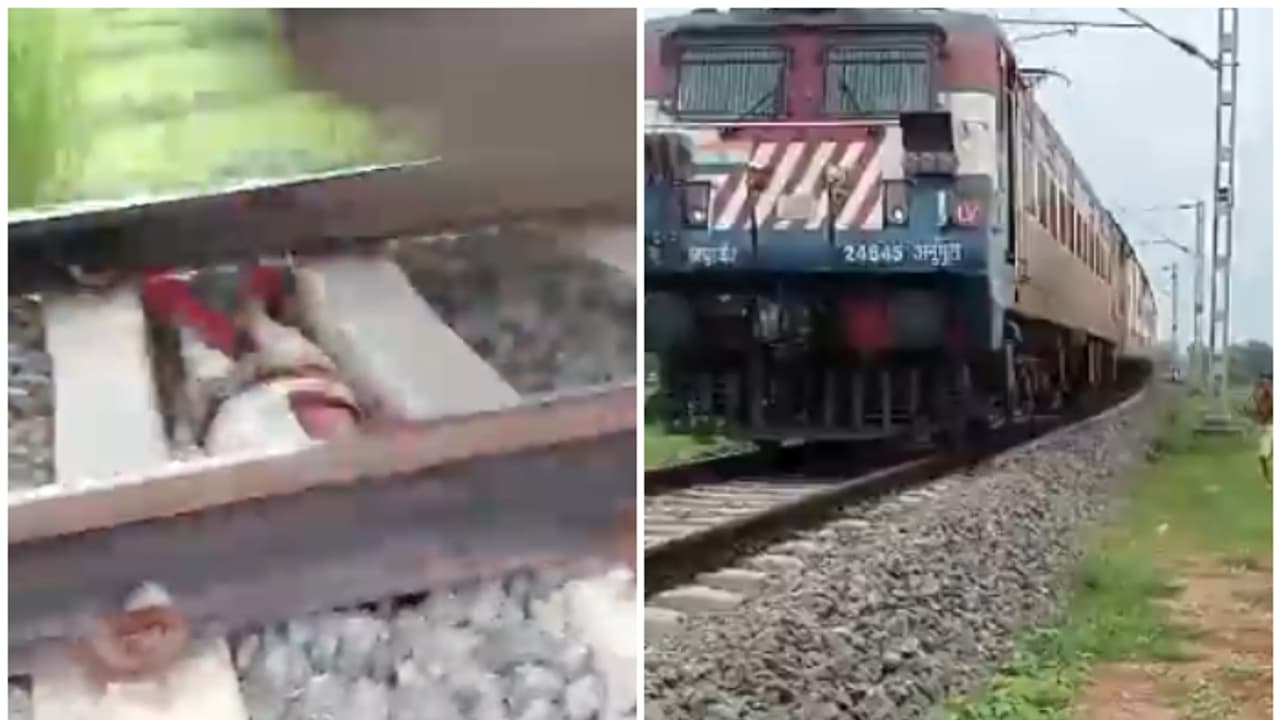 Child lying on tracks when train arrives ട്രെയിൻ വരുമ്പോൾ പാളത്തി ...