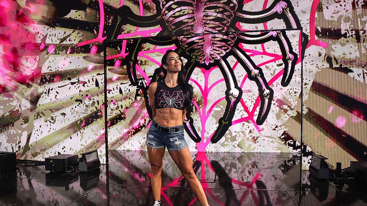 3 Big Factors Behind AJ Lee Aligning With Rhea Ripley At WWE Survivor ...